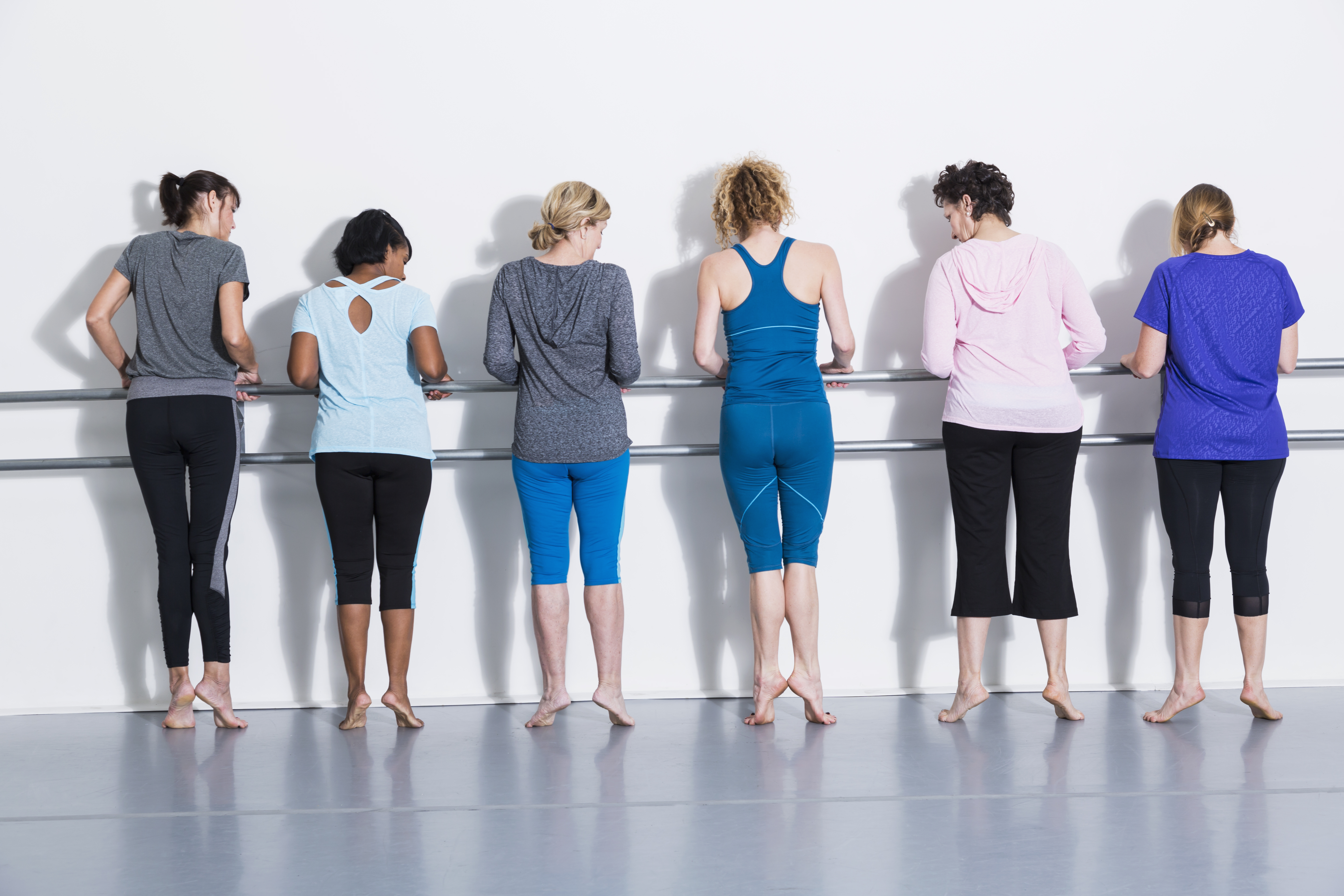 Women doing barre exercises - WellTuned by BCBST